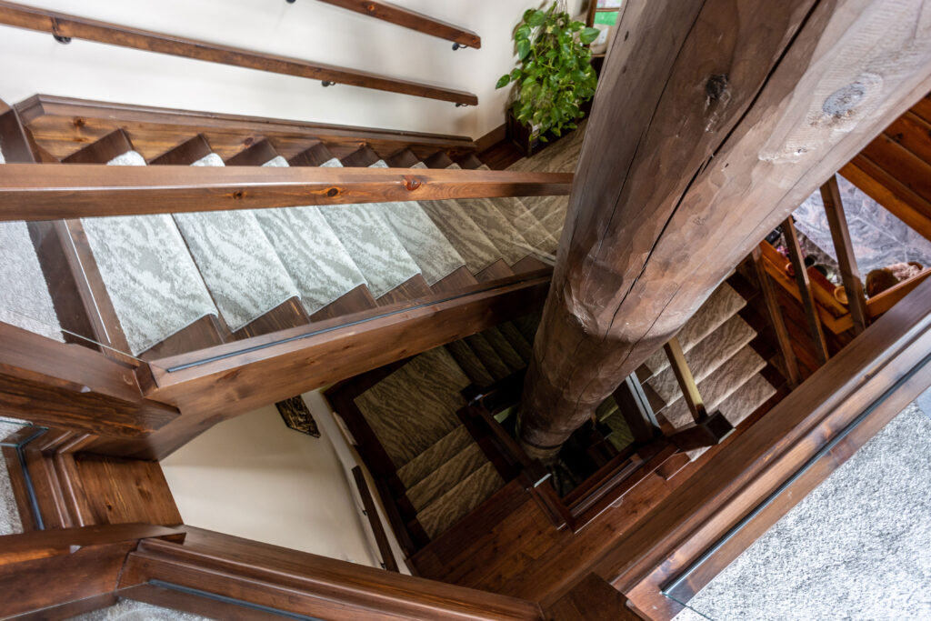Staircase Wrapping A Tree - Laverty Log Homes & Timber Frames