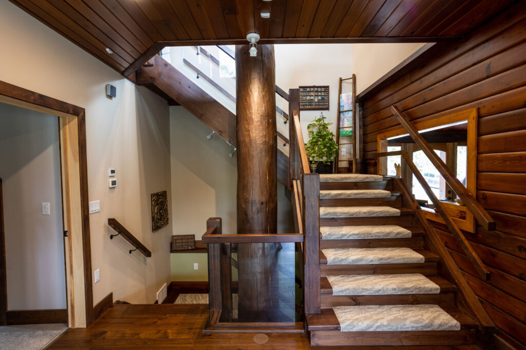 Staircase Wrapping A Tree - Laverty Log Homes & Timber Frames